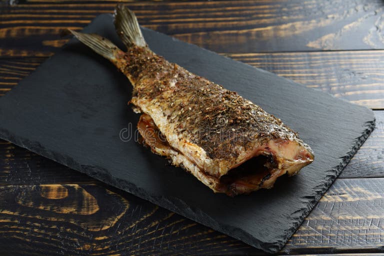 Baked Fish on the Table. Baked Carp Stock Photo - Image of dinner ...