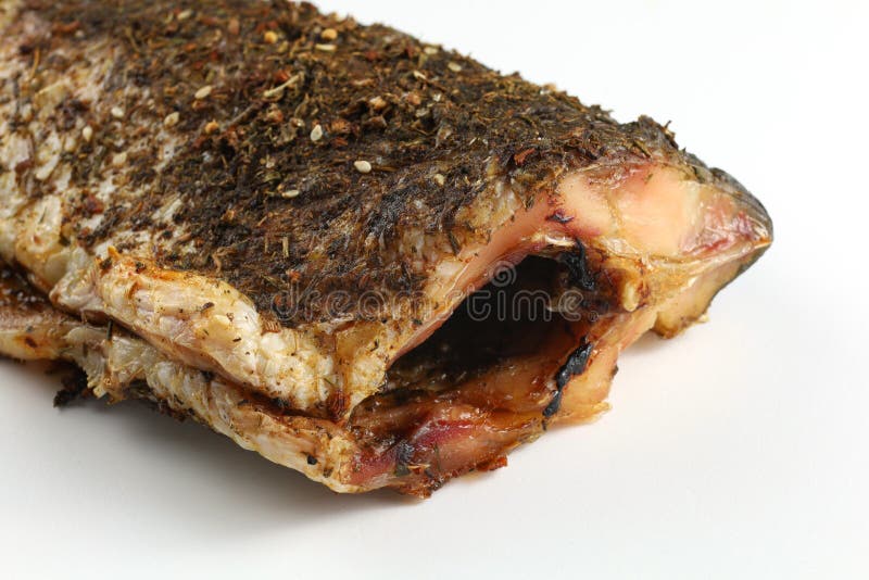 Baked Fish on the Table. Baked Carp Isolated on White Stock Image ...