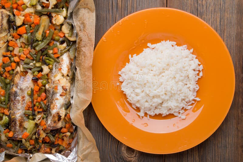 Baked Fish with Vegetables and Boiled Rice Stock Photo - Image of green ...