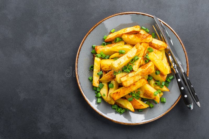 Baked, Fried Potato on Plate on Table Stock Image - Image of gourmet ...