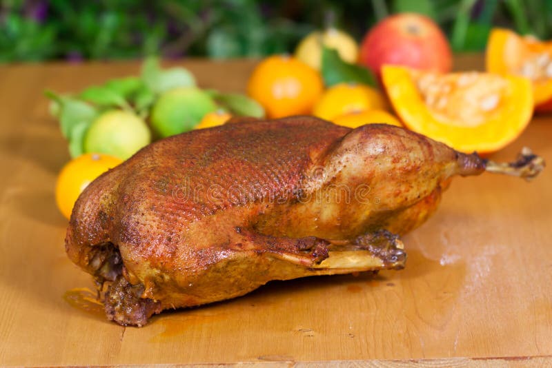 Baked Goose with Decoration of Fruits Stock Image - Image of foodstuff ...