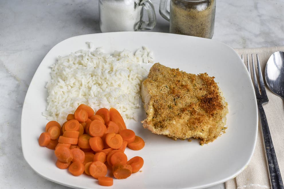Baked Haddock with Rice and Carrots Stock Image - Image of dinner ...