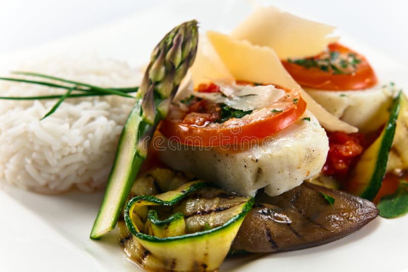 Baked Halibut with Vegetables Stock Photo - Image of rice, asparagus ...