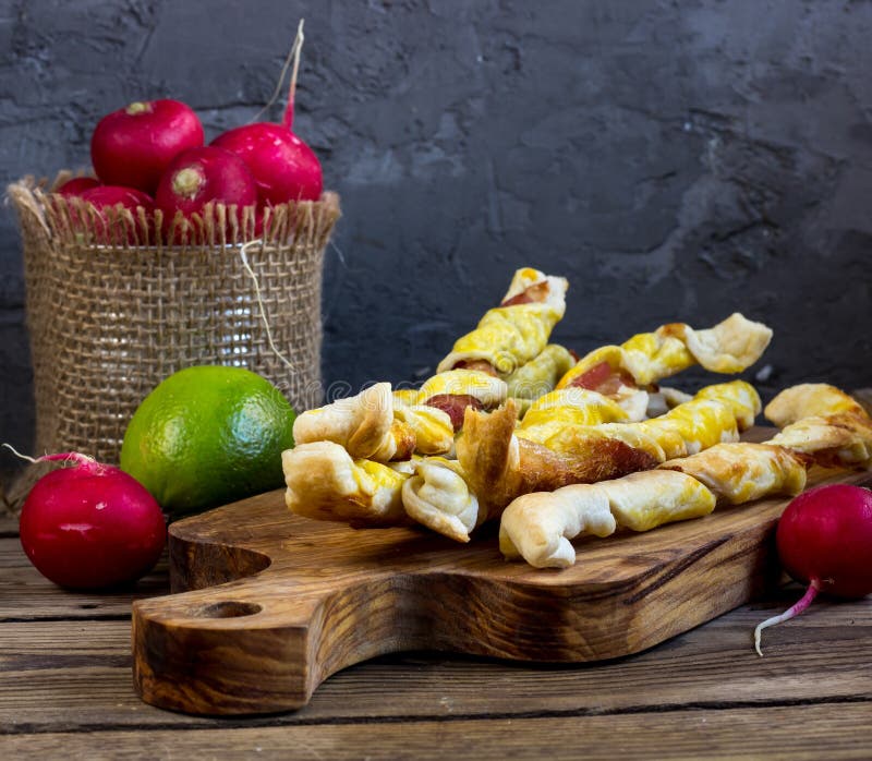 Baked Hearty Puff Pastry Sticks with Bacon Stock Photo - Image of ...