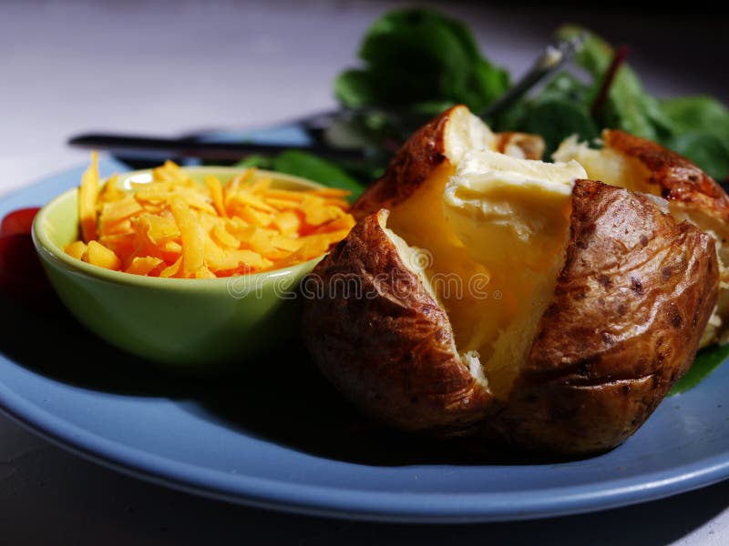 Baked Jacket Potato with Cheese and Salad Sides Stock Photo - Image of ...