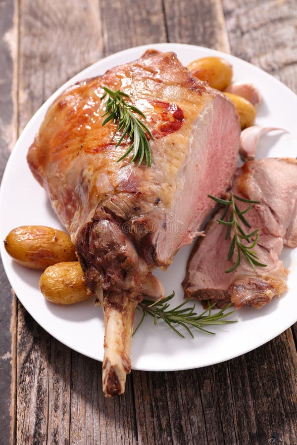 Baked lamb leg stock image. Image of festive, family - 107796355