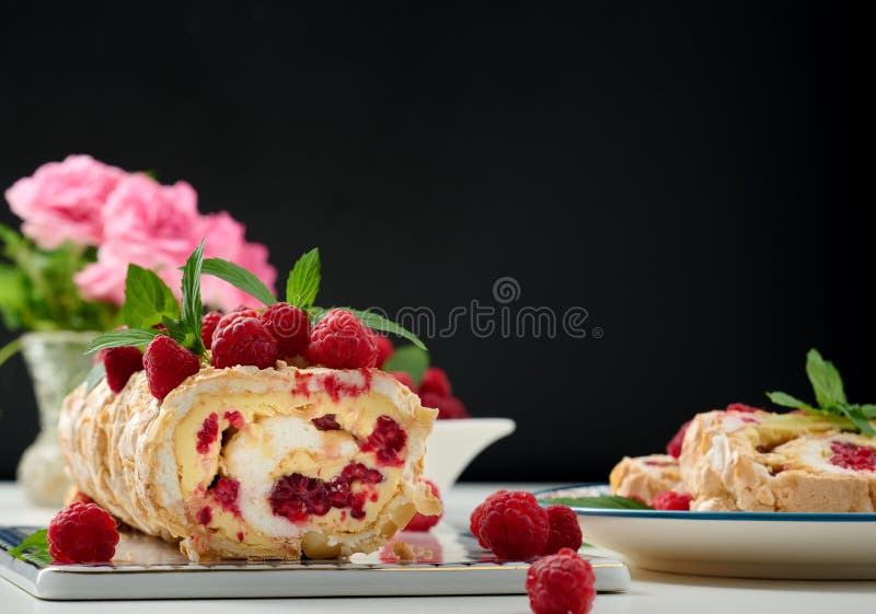 Baked Meringue Roll with Cream and Fresh Red Raspberry Stock Image ...
