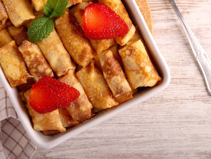 Baked Mini Crepes Rolls Filled with Cheese Stock Image - Image of food ...