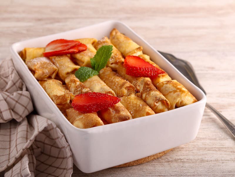 Baked Mini Crepes Rolls Filled with Cheese Stock Image - Image of treat ...