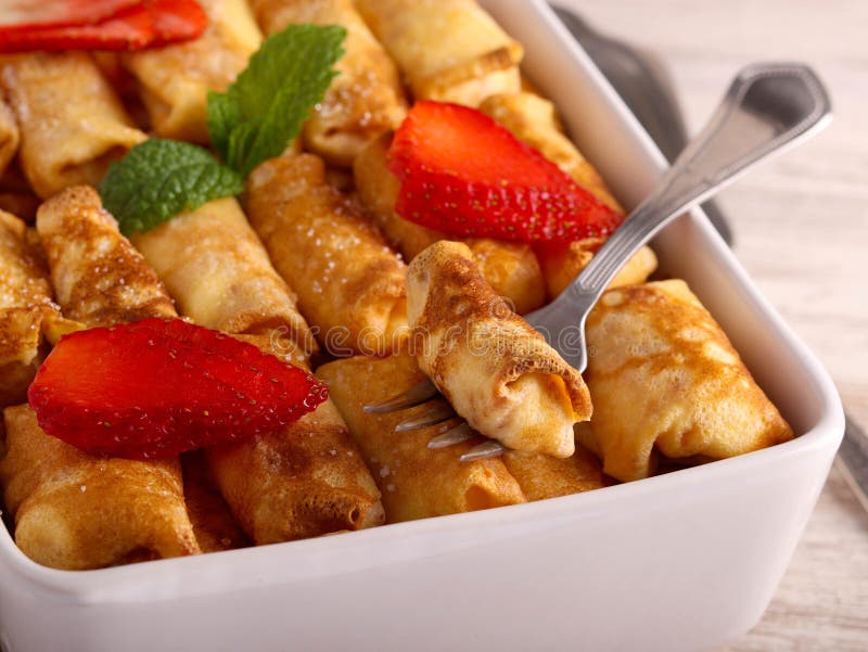 Baked Mini Crepes Rolls Filled with Cheese Stock Photo - Image of ...