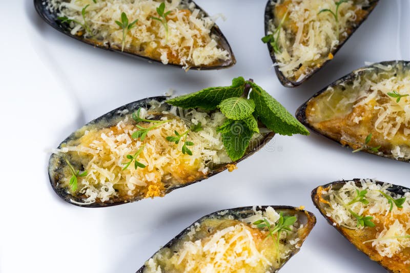 Baked Mussels with the Cheese Stock Photo - Image of recipe, plate ...