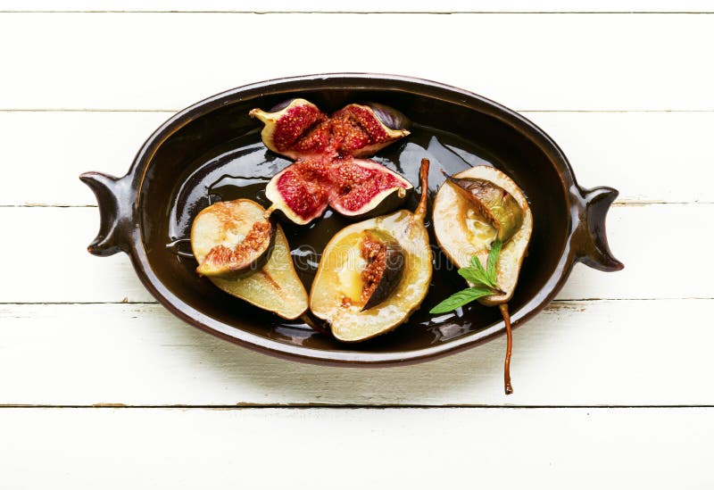Baked pear with figs stock photo. Image of flavor, diet - 230170406