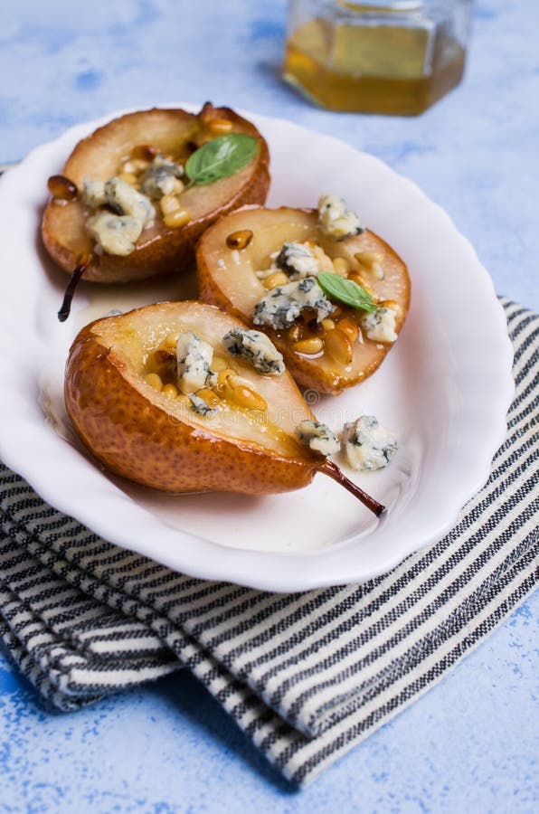 Baked pears with nuts stock photo. Image of enjoyment - 101253188