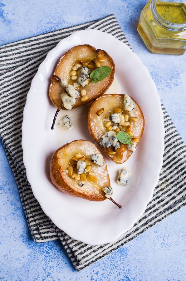 Baked pears with nuts stock image. Image of kitchen - 101253123