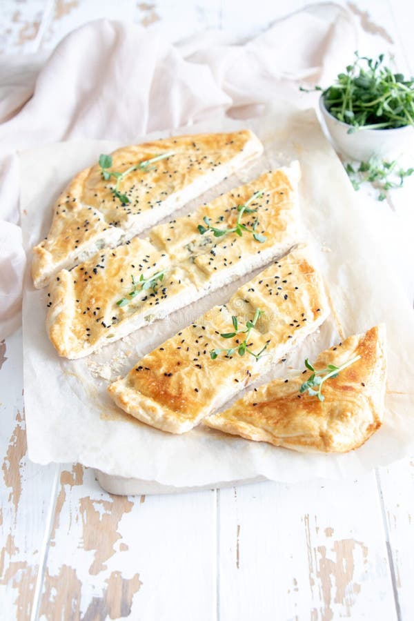 Baked Pie with Sesame Seeds and Greenery Stock Image - Image of lunch ...