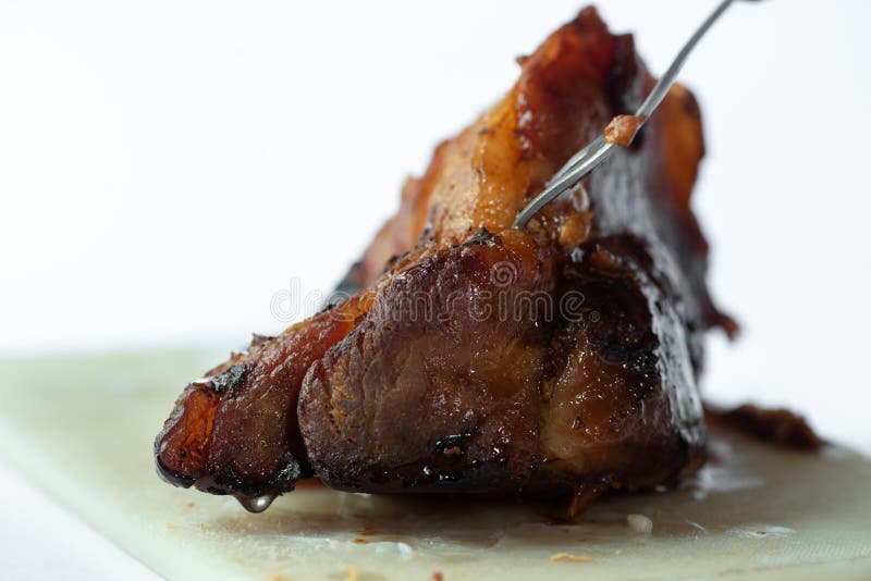 Baked pork knee with fork stock photo. Image of pork - 136819270