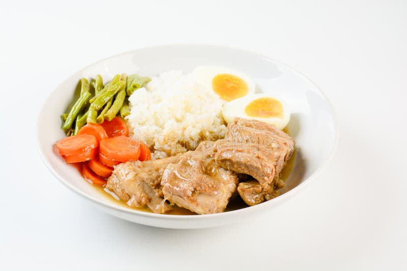 Baked pork ribs with rice stock image. Image of baked - 156329457