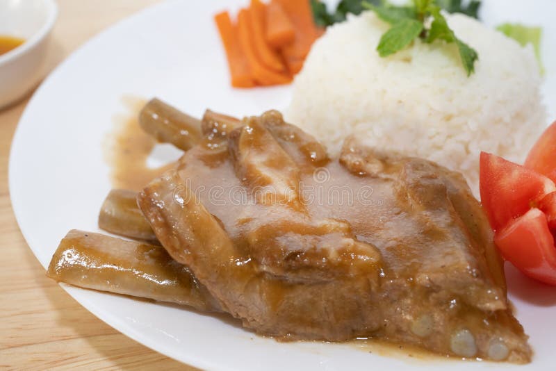 Baked Pork Ribs with rice stock photo. Image of ribs - 216528350
