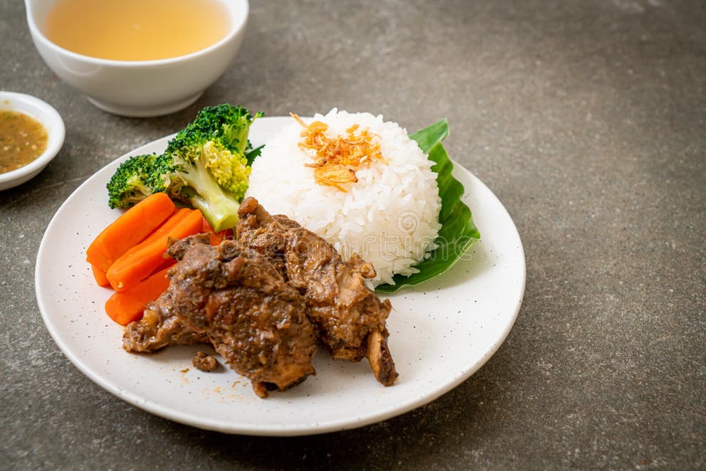 Baked Pork Ribs with Sauce stock photo. Image of herbs - 192527362
