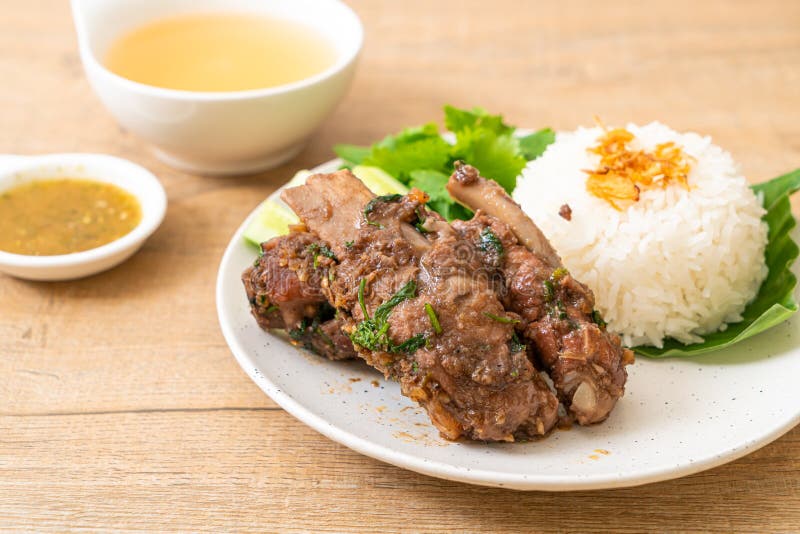Baked Pork Ribs with Sauce stock image. Image of herbs - 195143003