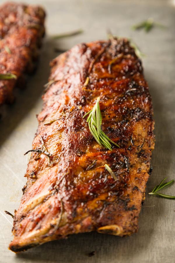 Baked pork ribs with sauce stock photo. Image of barbecue - 182624806