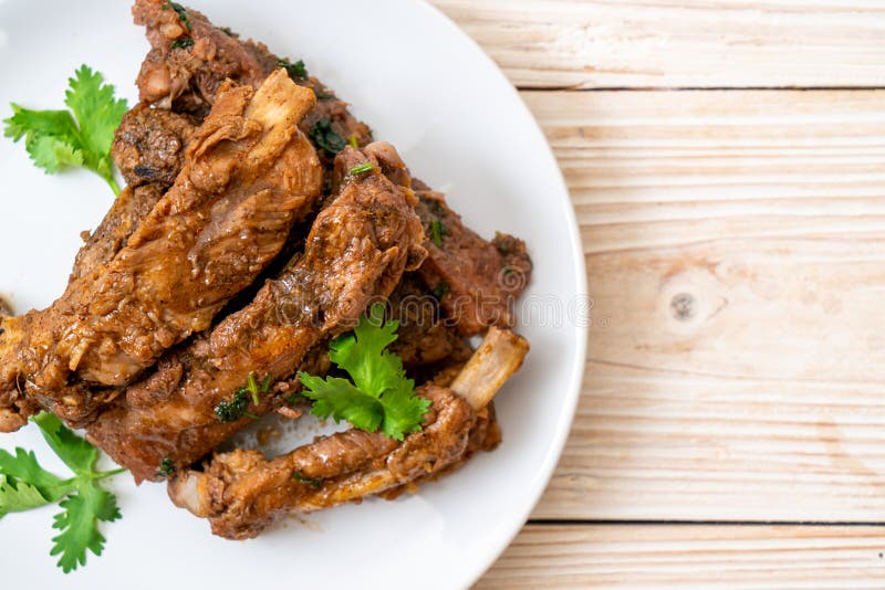 Baked Pork Ribs with Sauce stock image. Image of meal - 219079239