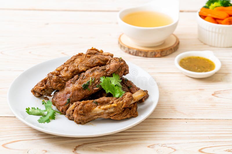 Baked Pork Ribs with Sauce stock image. Image of rice - 235006361