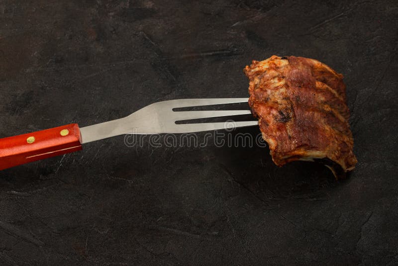 Baked Pork Strung on a Barbecue Fork Stock Image - Image of barbecued ...