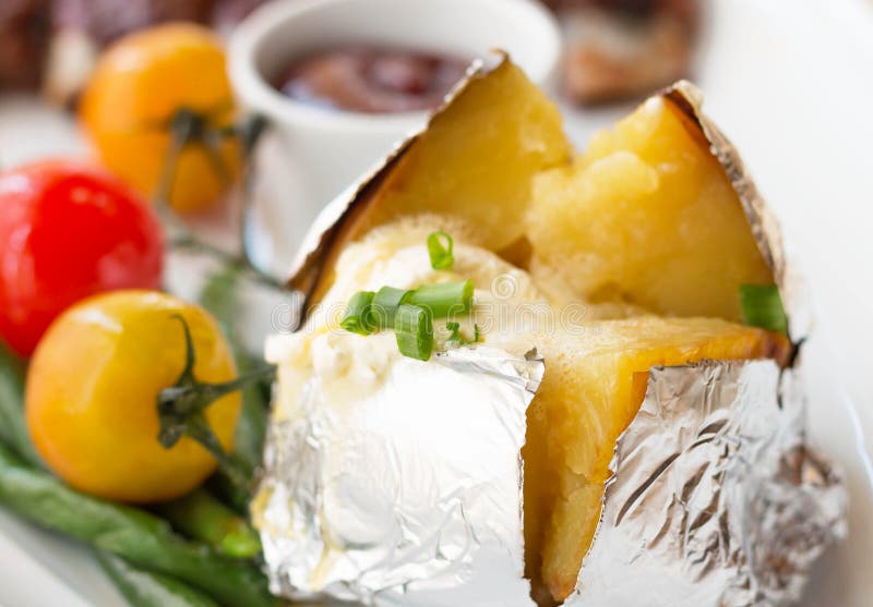 Baked potato with butter stock photo. Image of healthy - 83980006