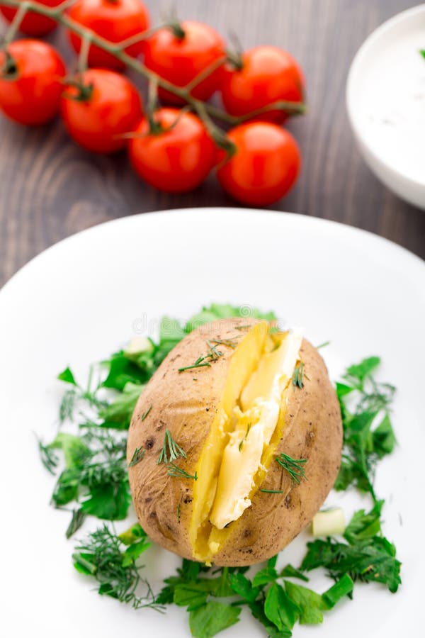 Baked potato with butter stock photo. Image of bowl, spud - 34282610