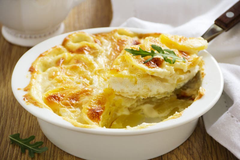 Baked potato Dauphinois stock photo. Image of roasted - 51477412