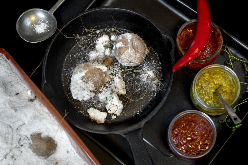 Baked Potatoes in Salt with Hot Salsa Stock Photo - Image of lunch ...