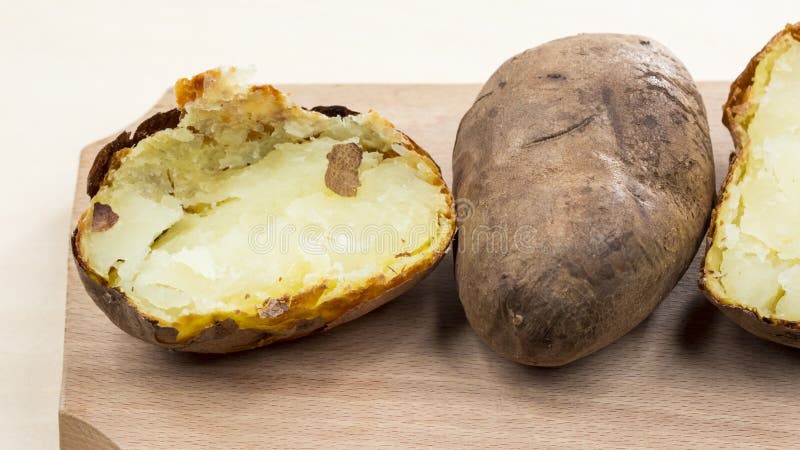 Baked potatoes with shell stock photo. Image of food - 44010918