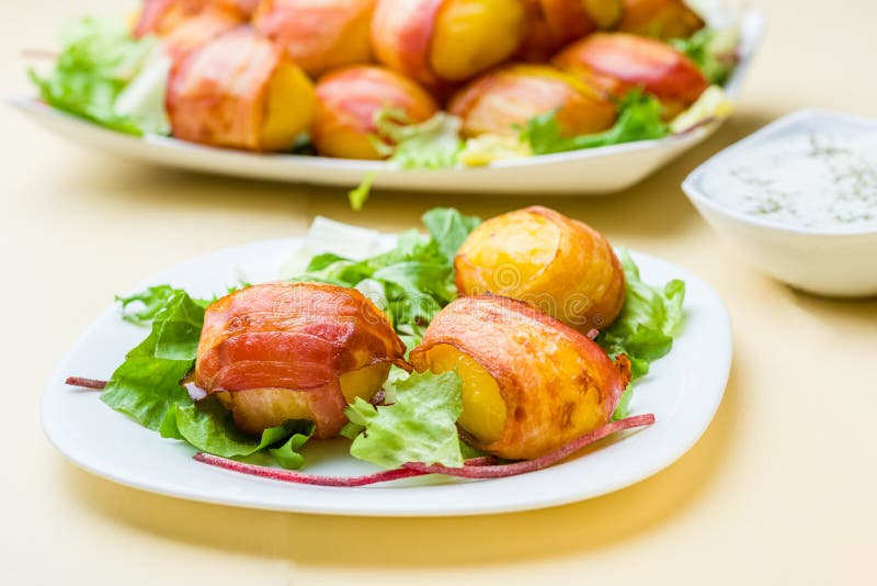 Baked Potatoes Wrapped in Bacon Stock Photo - Image of parsley ... Baked Potatoes Wrapped in Bacon Stock Photo - Image of parsley ...