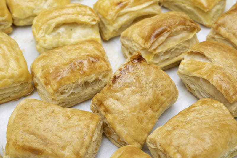 Baked puff pastry squares stock photo. Image of dessert - 306166726
