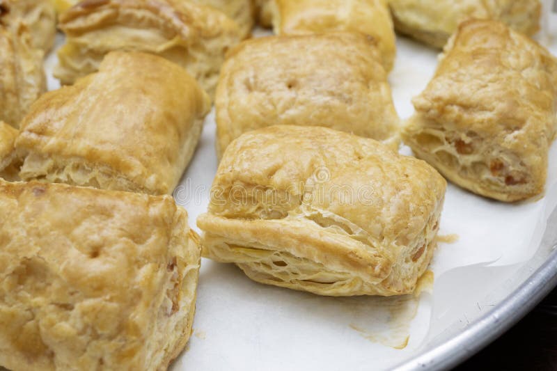 Baked puff pastry squares stock image. Image of closeup - 306166743