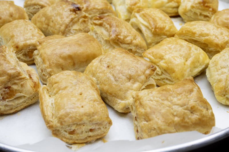 Baked puff pastry squares stock photo. Image of breakfast - 306166770