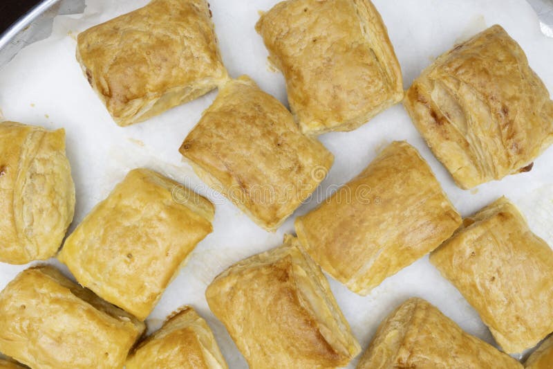 Baked puff pastry squares stock image. Image of piece - 306166797