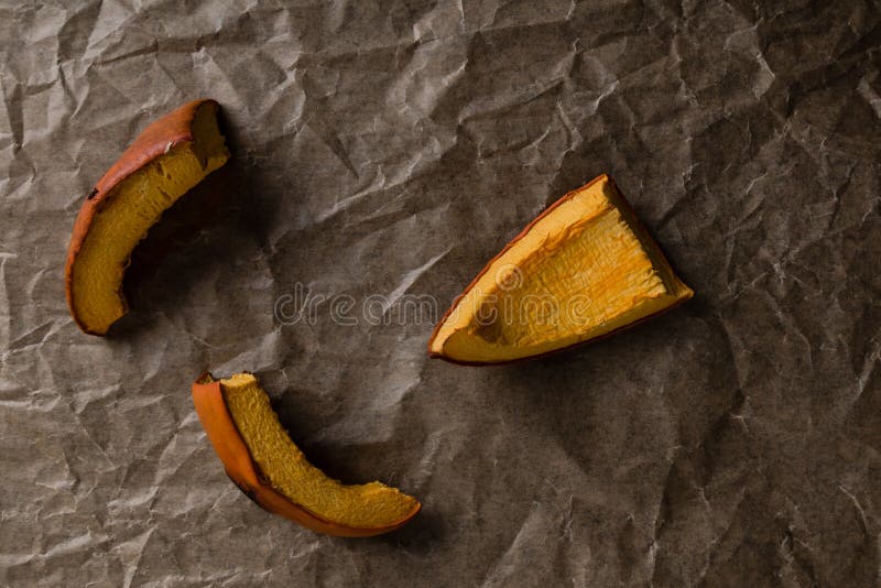 Baked pumpkin on paper stock photo. Image of food, healthy - 60938694