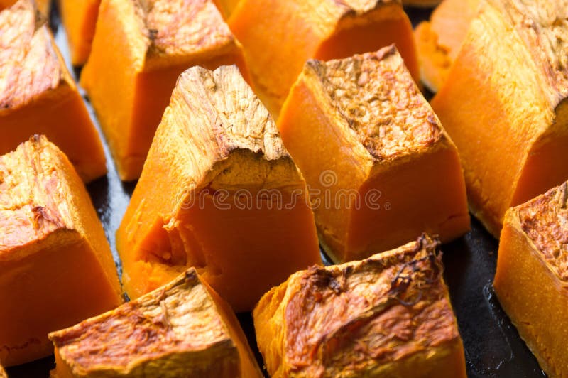 Baked Pumpkin Slices on a Cooking Plate Stock Photo - Image of season ...