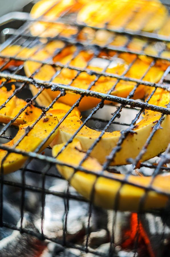 Baked Pumpkin Slices on the Grill Grid Stock Photo - Image of cuisine ...