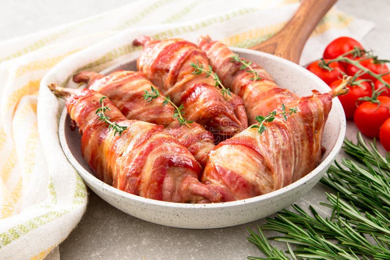 Baked Quail Wrapped in Bacon in a Frying Pan with Spices Stock Photo ...