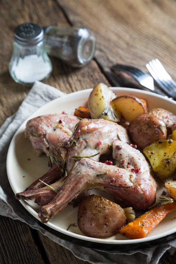 Baked Rabbit with Vegetables Stock Photo - Image of potatoes, hunting ...