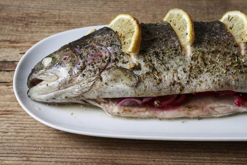 Baked Rainbow Trout with Lemon Stock Image - Image of rainbow, recipe ...