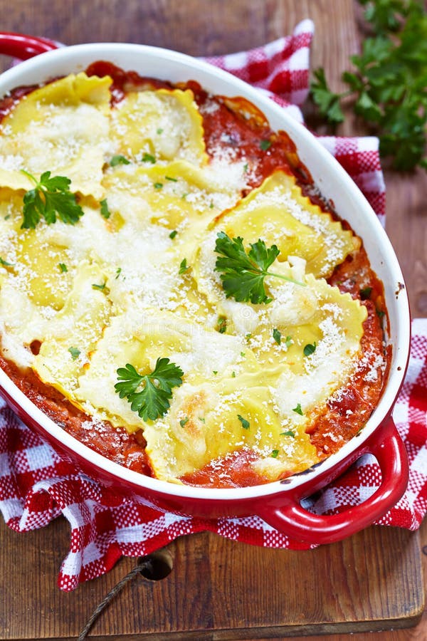 Baked Ravioli in Tomato Sauce Stock Photo - Image of dinner, fork: 40803910