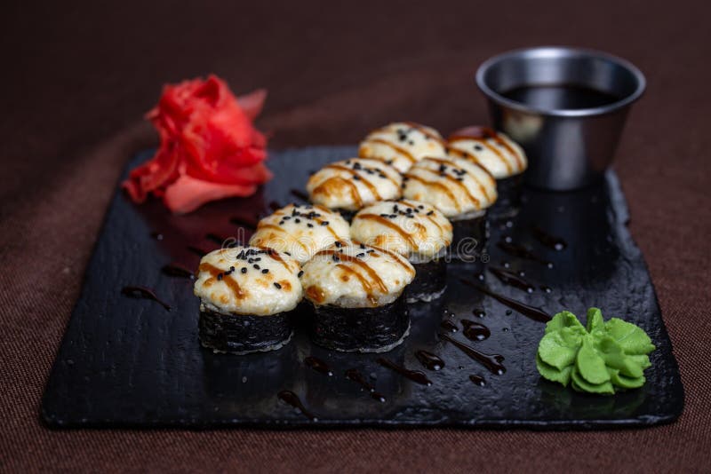 Baked Rolls with Eel and Cheese and Sauce. Stock Photo - Image of ...