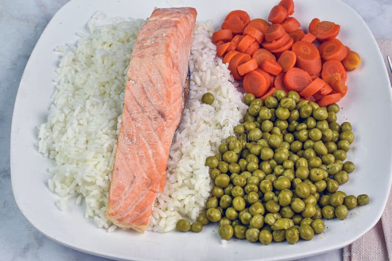 Baked Salmon with Rice Peas and Carrots Stock Image - Image of seafood ...