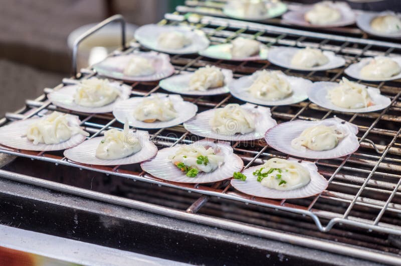 Baked scallops cheese stock photo. Image of sauce, dinner - 83955868