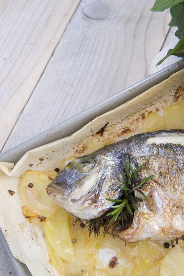 Baked Sea Bream stock image. Image of healthy, potatoes - 33290459