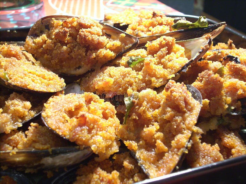 Baked shellfish stock image. Image of breadcrumb, fish - 3939841